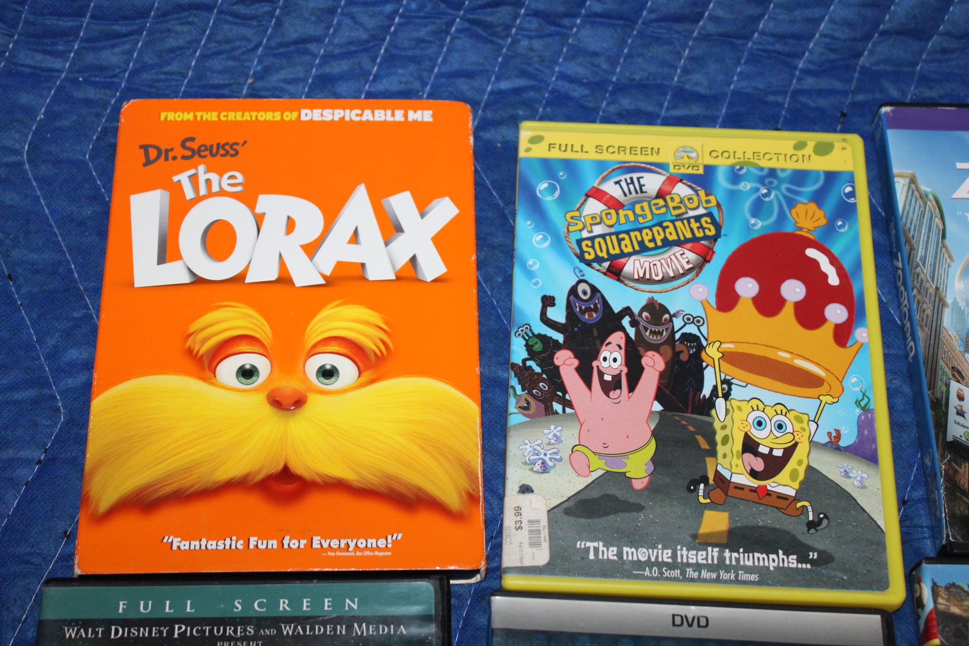 Lot 51 Children DVD Movies Spongebob, Zootopia, Disney – Sathers Auctions